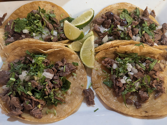 These street-style tacos don't need fancy presentation – just fresh cilantro, onion, and lime to let the perfectly seasoned meat shine through.