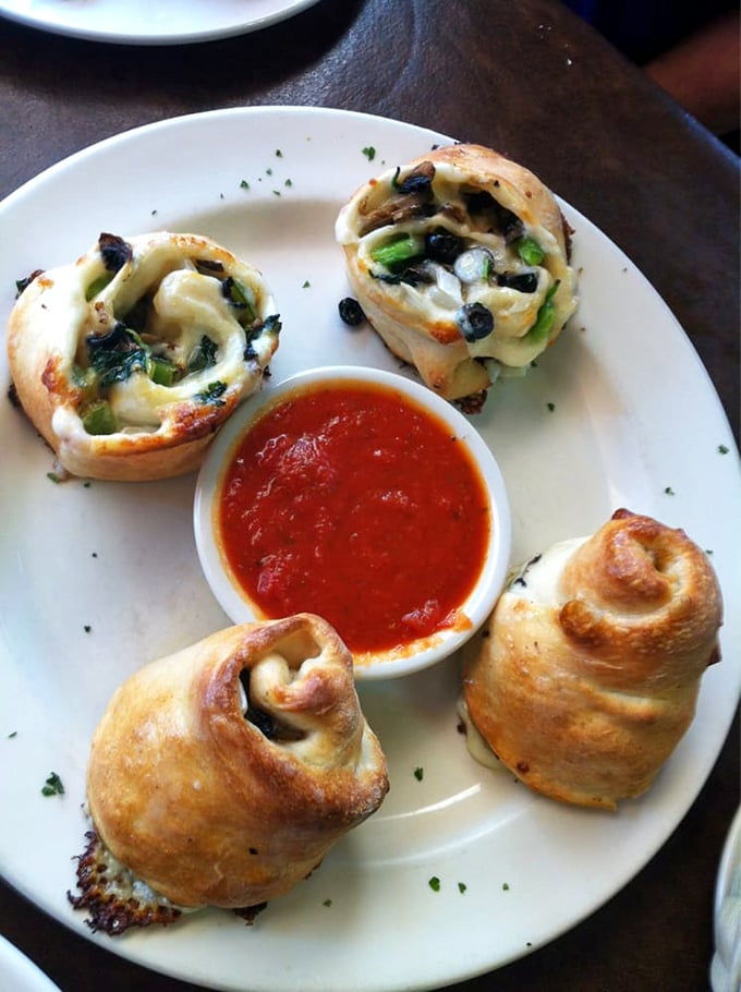 These stuffed pinwheels aren't just appetizers—they're little wheels of joy spinning you straight into flavor town.