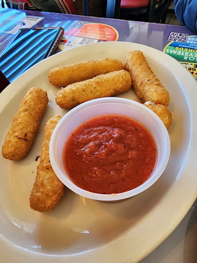Mozzarella sticks: the bridge between childhood joy and adult indulgence. That marinara cup is about to experience a cheese pull for the ages.