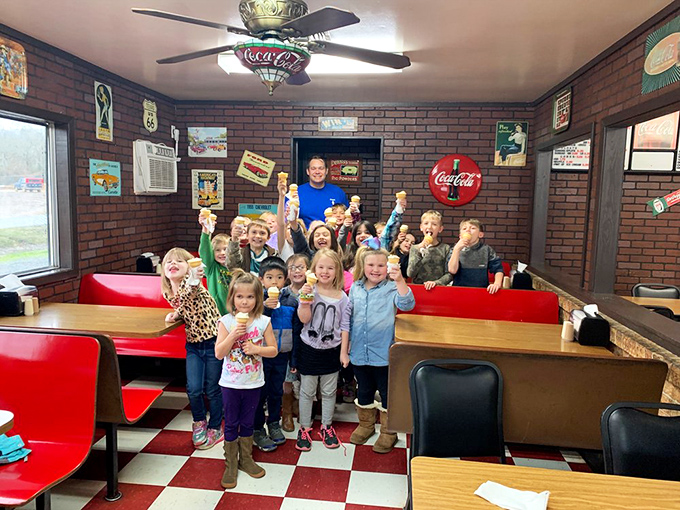 Ice cream bringing pure joy to future food critics – proving that some culinary experiences transcend age, trends, and iPhone versions.