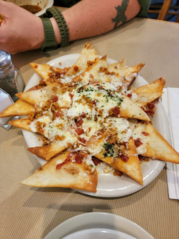 These loaded nachos Italian-style prove that cultural fusion isn't just possible—it's necessary for world peace and happiness.