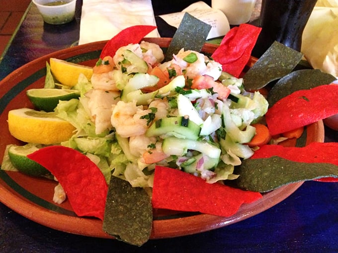 This isn't just a salad—it's a refreshing intermission between acts of delicious excess. Those colorful chips are the backup dancers to the ceviche star.