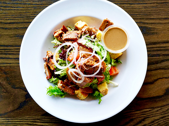 Even the salads get the barbecue treatment—because sometimes you want your vegetables to hang out with the cool kids from the smoker.