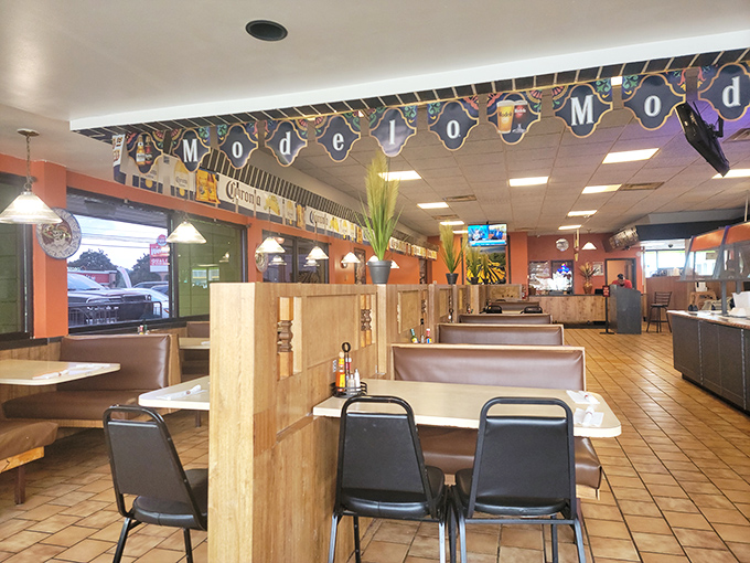 The warm, inviting interior where Corona signs meet traditional decor. This isn't just a restaurant—it's a cultural crossroads where Tex meets Mex.
