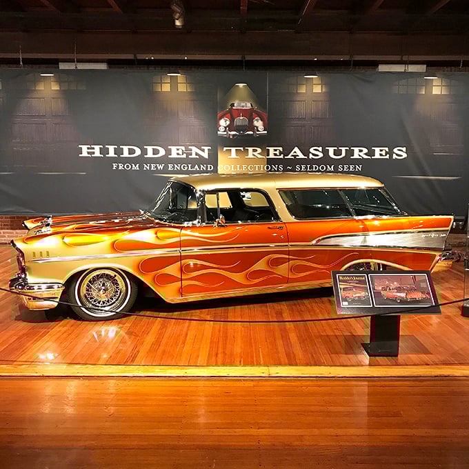 Flame decals and a two-tone paint job make this 1957 Chevy Nomad the coolest wagon on the block—suburban transportation with serious attitude.