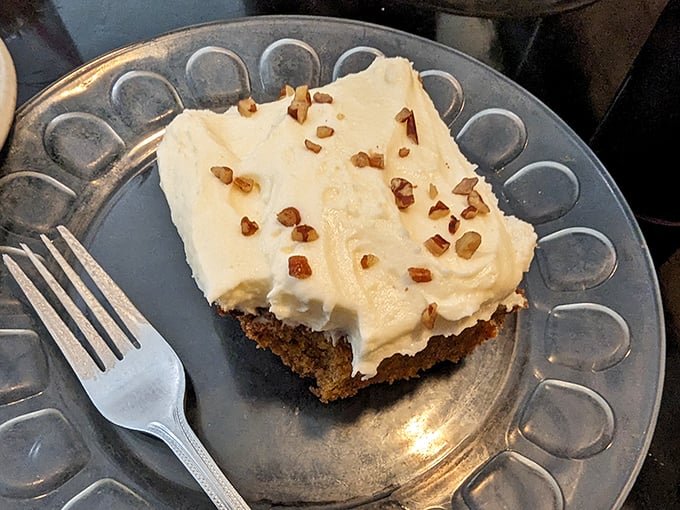 This isn't just cake—it's therapy with frosting. Those pecans on top are the jewelry that completes this sweet ensemble.
