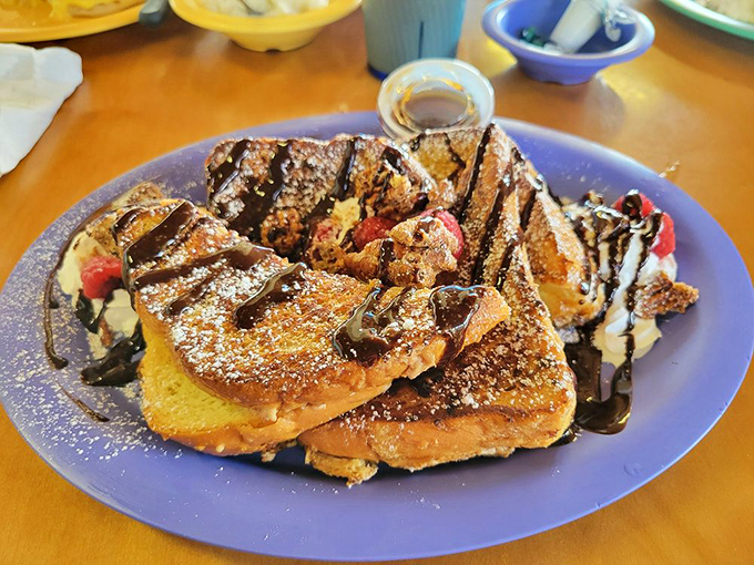 Cannoli Stuffed French Toast that makes dessert jealous. This sweet morning masterpiece, drizzled with chocolate, makes you question why we ever separated breakfast from dessert.