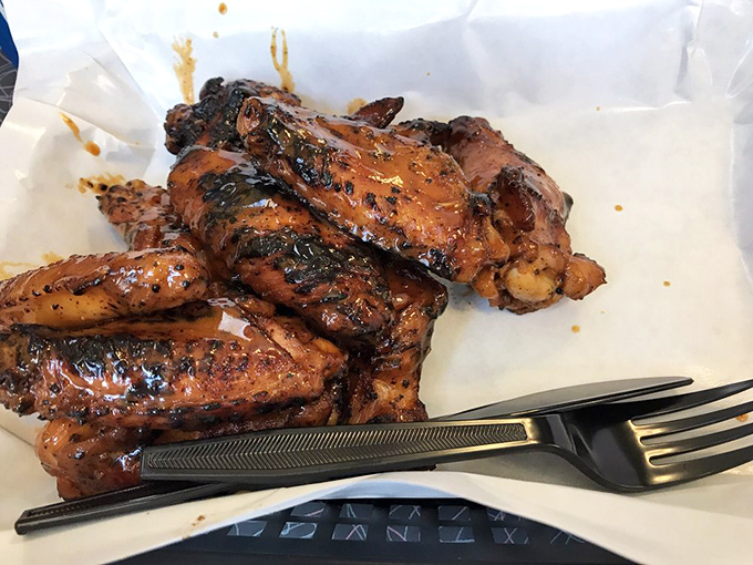 These wings haven't just been smoked - they've been transformed into sticky, spicy proof that chicken can absolutely steal the barbecue spotlight.