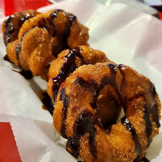 Churros got all dressed up for the occasion, drizzled in chocolate and dusted with cinnamon sugar – dessert that demands to be noticed. 
