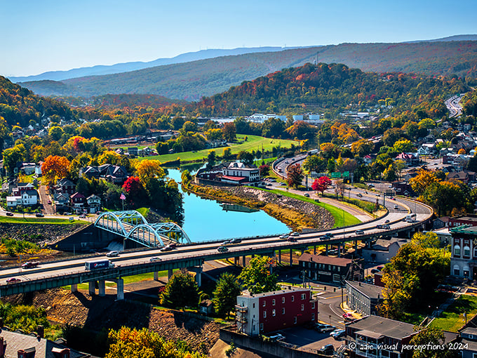 Cumberland nestles between mountains like a hidden treasure, where the autumn palette rivals New England's but the cost of living doesn't.