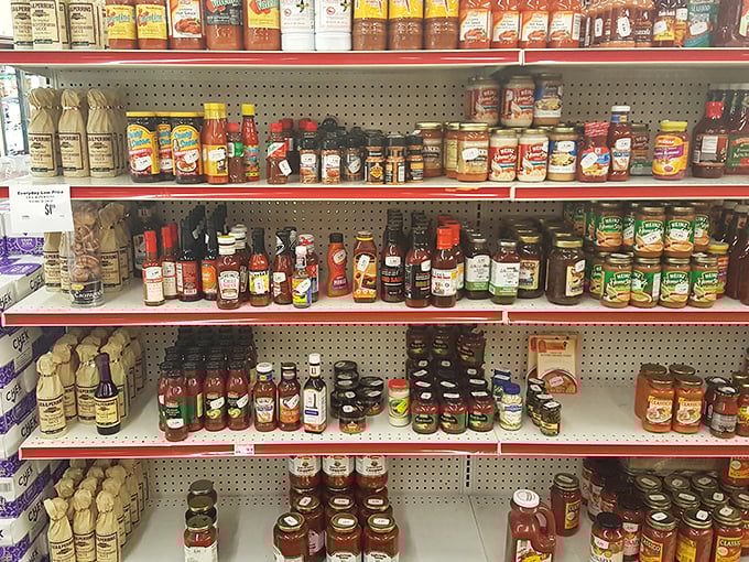 Hot sauces, maple syrups, and specialty condiments lined up like soldiers of flavor—each bottle a potential kitchen game-changer at a fraction of the cost.