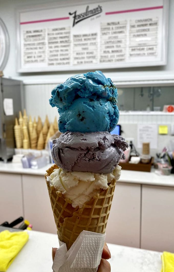 The triple-threat cone featuring Cookie Monster's signature blue—proof that sometimes the most photogenic foods also taste the best. 
