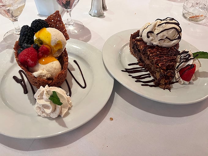Desserts that make you reconsider saving room—a praline basket filled with berries and ice cream alongside pecan pie that would make grandma reach for her recipe box.