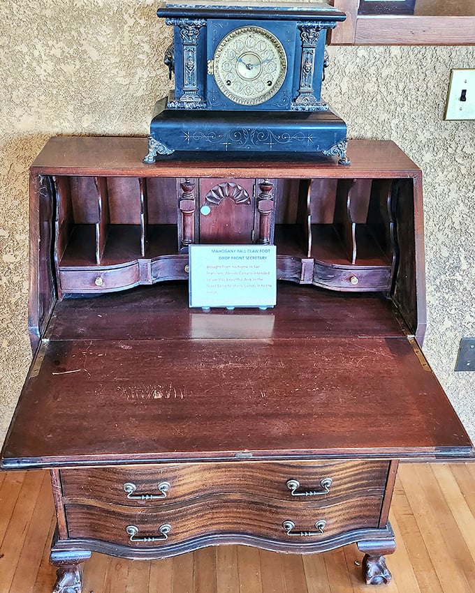 This elegant fall-front desk and ornate clock speak to the refined taste that went into furnishing this unexpected desert palace.