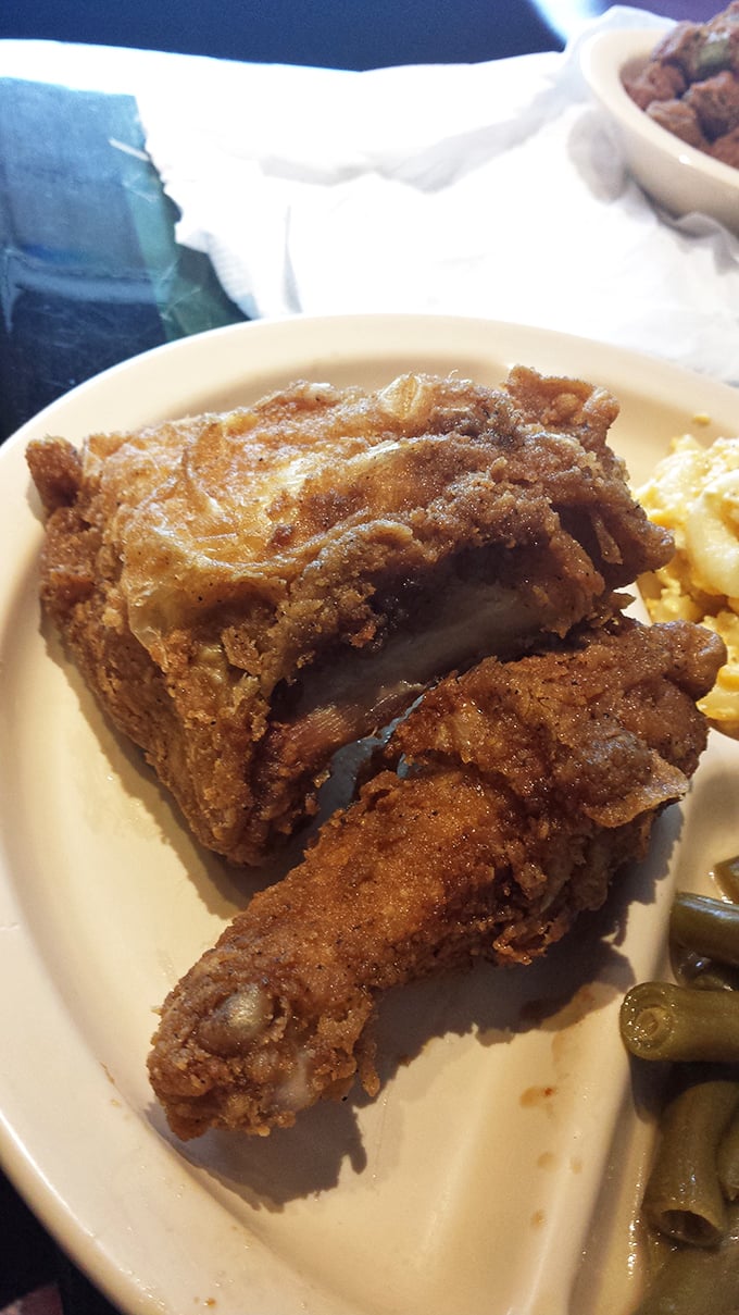 Fried chicken that's worth crossing state lines for—golden, crispy exterior giving way to juicy meat that makes you close your eyes in appreciation.