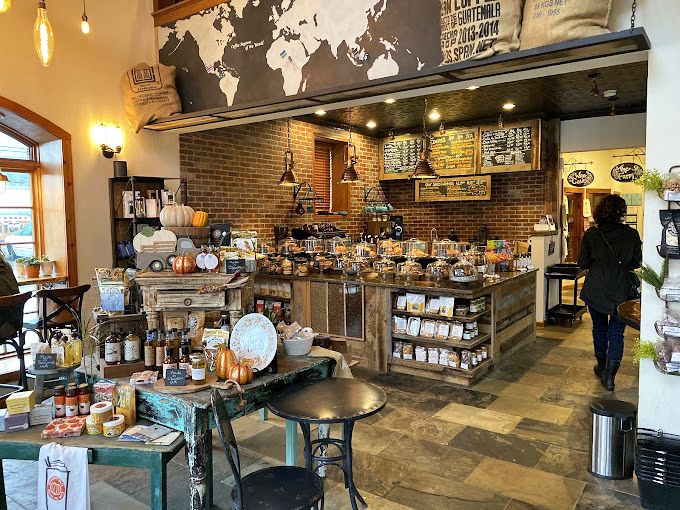 Where coffee dreams and retail therapy meet. The world map above reminds you that great coffee transcends borders, while local goods keep you firmly in Georgia.