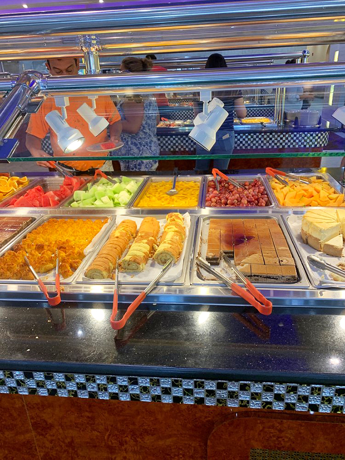 Sweet finales await at the dessert station, where slices of cake and fruit tartlets provide the perfect encore to your multi-act dining performance.