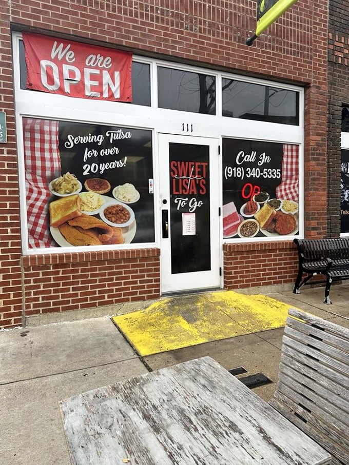 "We are OPEN"—three beautiful words that promise access to some of Tulsa's finest soul food. That yellow welcome mat might as well be gold.