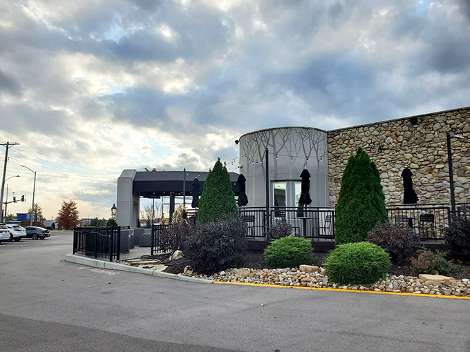 The outdoor patio waits patiently under moody Missouri skies, ready to host alfresco feasts when Mother Nature cooperates.