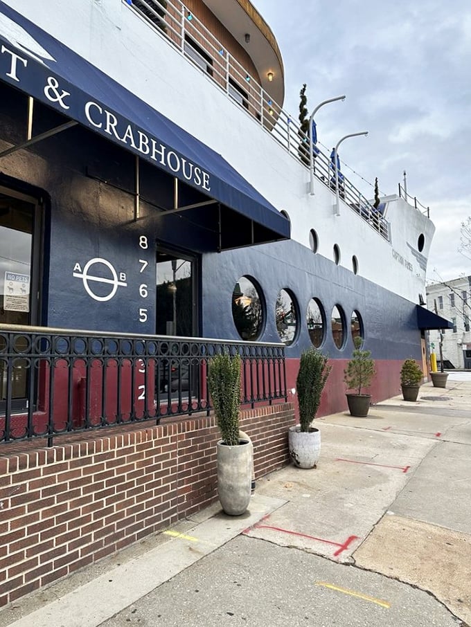 The entrance promises nautical adventures ahead. Those portholes aren't just for show – they're windows into a seafood lover's paradise.