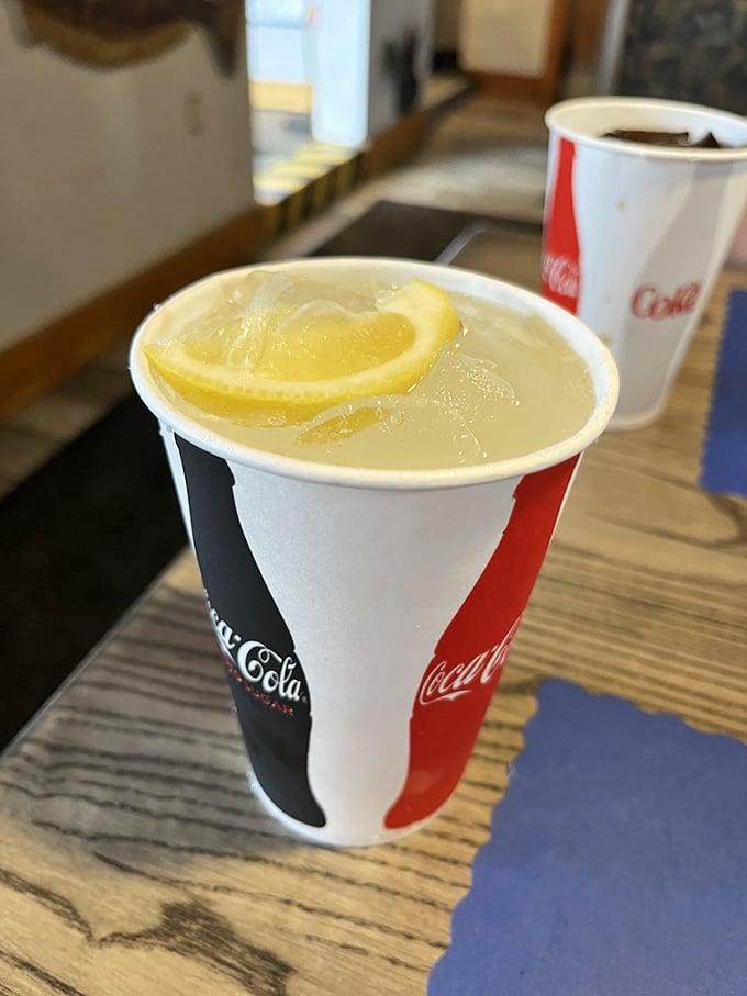 A classic lemonade in a Coca-Cola cup—the perfect palate cleanser between bites of briny, buttery seafood perfection.