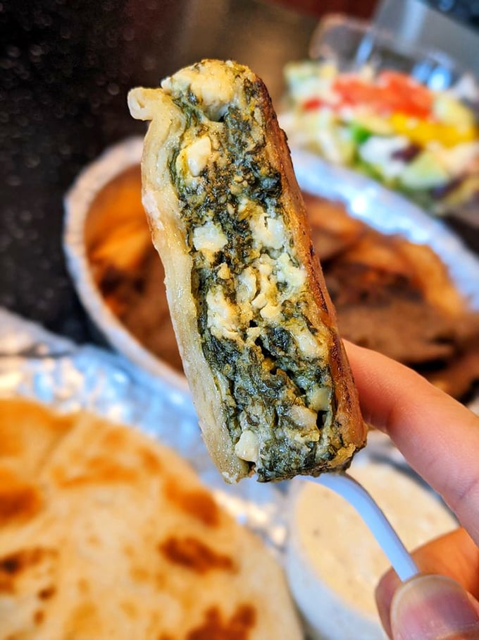 Spanakopita that makes you wonder why you ever ate anything else. That spinach-feta filling isn't just food—it's the stuff of Athenian dreams wrapped in flaky phyllo.