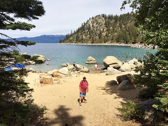 Lake Tahoe's sandy beaches welcome visitors with crystal waters so clear you can count pebbles twenty feet below the surface.