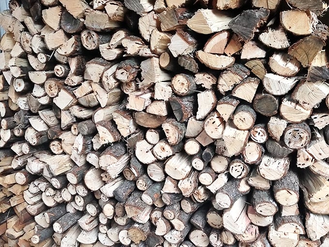 Behind every great barbecue is a serious wood pile. These logs aren't just fuel—they're the unsung flavor heroes of everything you'll eat.
