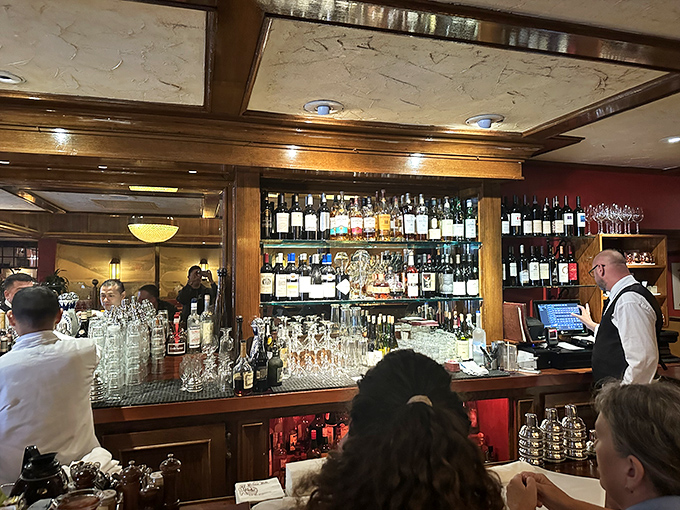 The bar at House of Prime Rib – where classic cocktails are crafted with the same reverence as the legendary beef that brings everyone here.