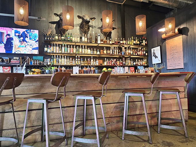 The bar at ZZQ isn't just serving drinks—it's offering liquid courage to help you order that extra half-pound of brisket you know you want.
