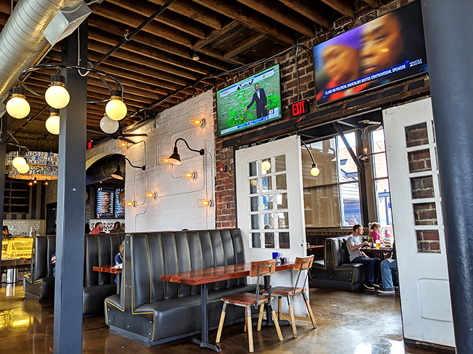 Cozy booths offer front-row seats to sports on TV, proving that watching the game pairs perfectly with schnitzel and German hospitality.