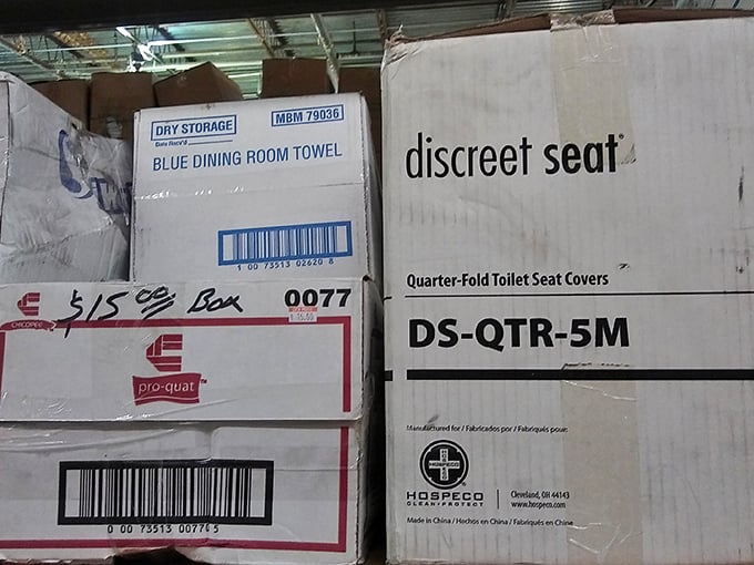 Commercial-sized boxes of everyday necessities stacked like urban skyscrapers. Bulk buying without the membership fees or commitment issues.