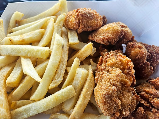 Catfish nuggets that could convert even the most dedicated seafood skeptic. Crispy outside, tender inside—the Midwest's answer to coastal cuisine.