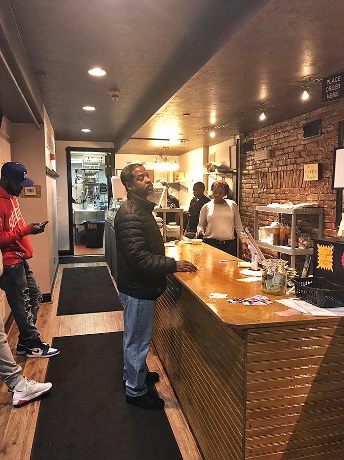 Where the magic happens – the counter where orders are placed and culinary dreams come true. The gateway to soul food paradise.