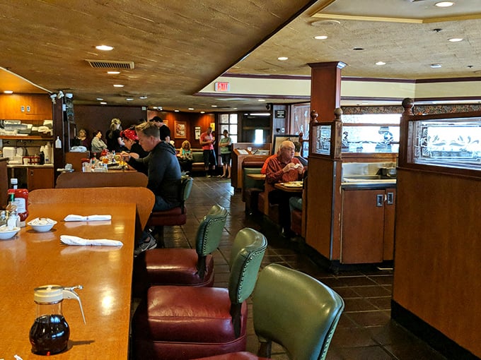 Counter dining at its finest—where regulars become family and the coffee cup is never empty for long.