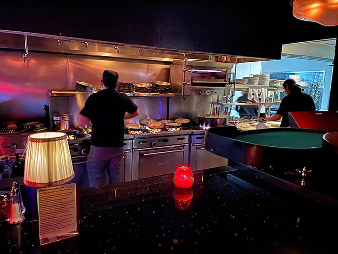 Behind the scenes, the kitchen staff works their magic. It's like watching a well-choreographed dance – with more pasta.