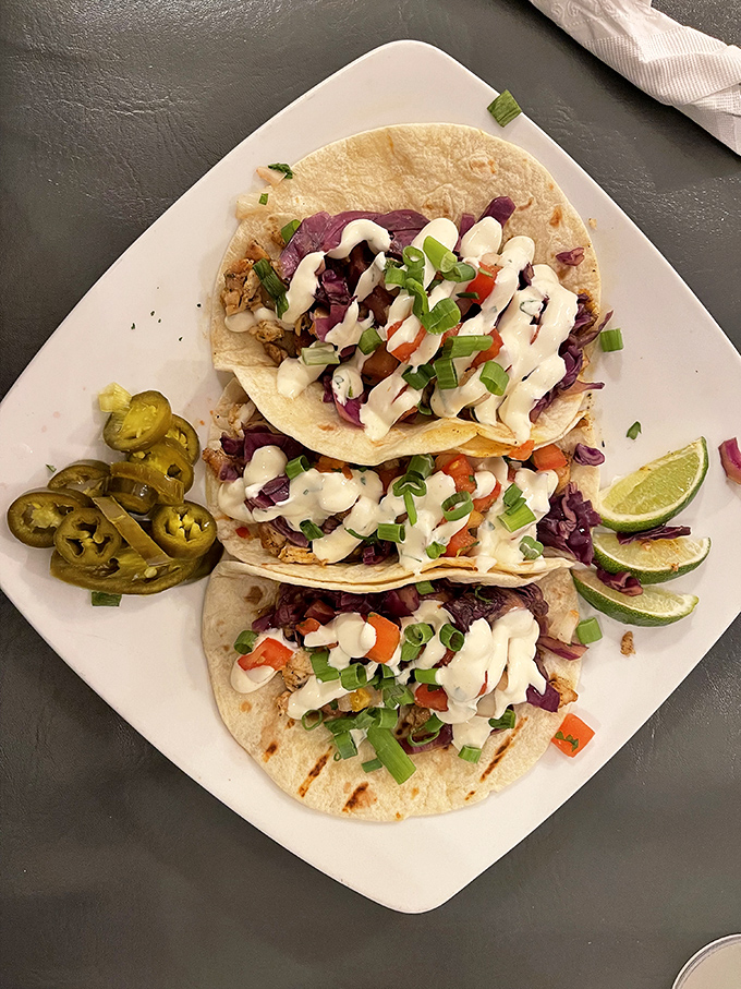Fish tacos that bring Baja to the Mountain State. The drizzle of sauce, the fresh cabbage crunch—it's a vacation wrapped in a tortilla.
