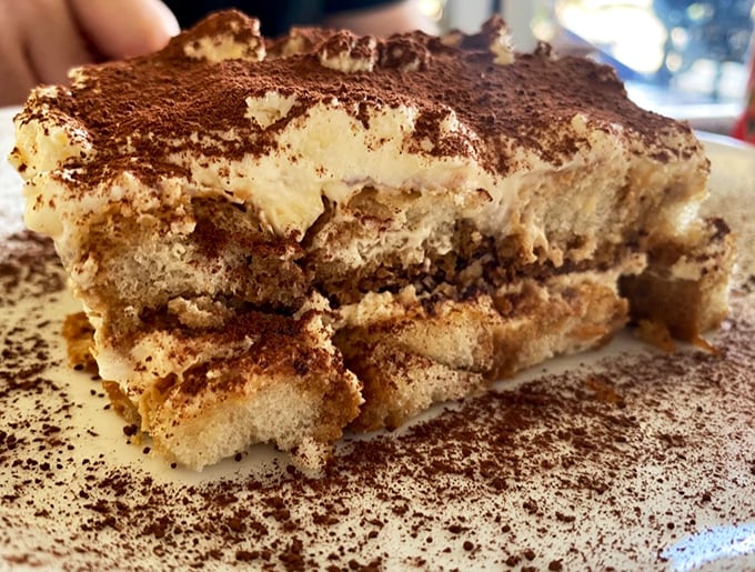 Tiramisu that makes time stand still. Each cocoa-dusted layer offers a perfect balance of coffee, cream, and pure joy.