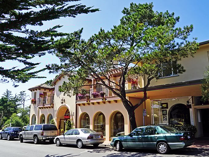 Spanish-style architecture with charming balconies and arches creates the fairytale village vibe that makes Carmel feel like a movie set come to life.