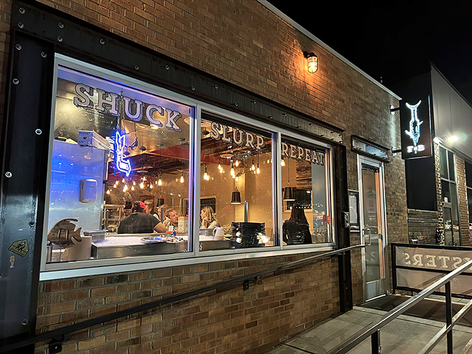 Fish N Beer's glowing storefront beckons like a lighthouse for seafood lovers. "Shuck, Slurp, Repeat" isn't just a motto—it's a way of life here.