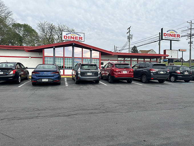 Main Street Family Diner (exterior day): The classic red-trimmed diner that screams "your diet ends here!" A Waynesboro landmark where calories don't count before noon.