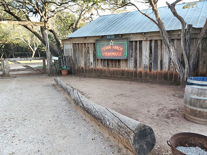 Rustic wood siding and a tin roof – this isn't just a steakhouse, it's a time machine to the Old West.