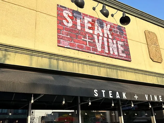 The bold "STEAK + VINE" sign promises exactly what you'll get—extraordinary beef and perfect wine pairings in downtown La Grange.