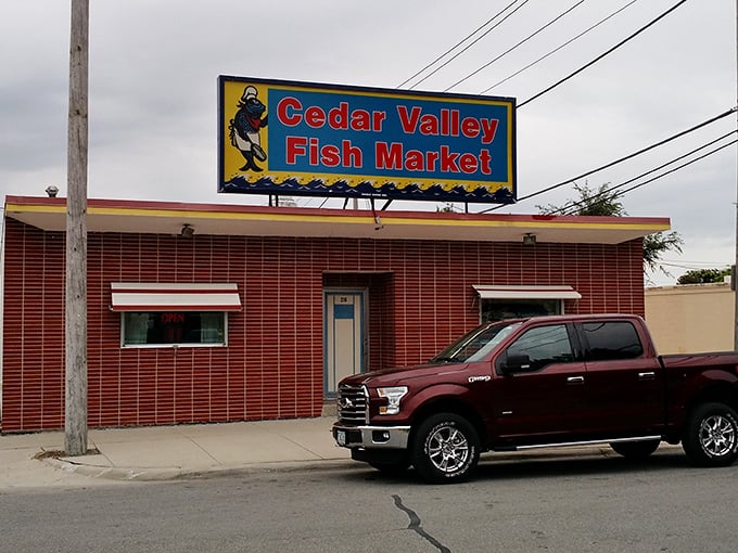 That vibrant sign isn't just bright; it's a beacon calling to seafood lovers hidden in Iowa's heartland.