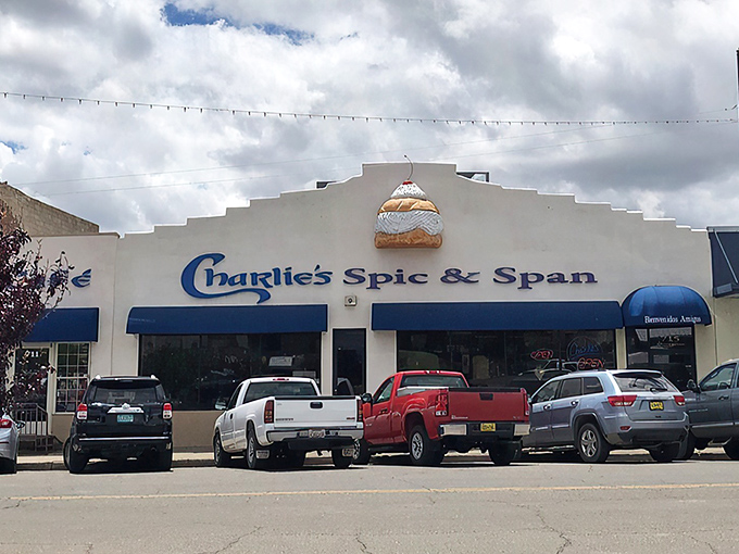 That blue awning promises comfort food magic inside – the kind that makes you want to hug the chef afterward.