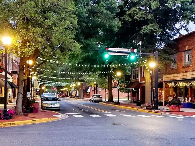 As evening falls, Dover's charming downtown transforms with twinkling lights—like a small-town movie set where retirement dollars stretch further.