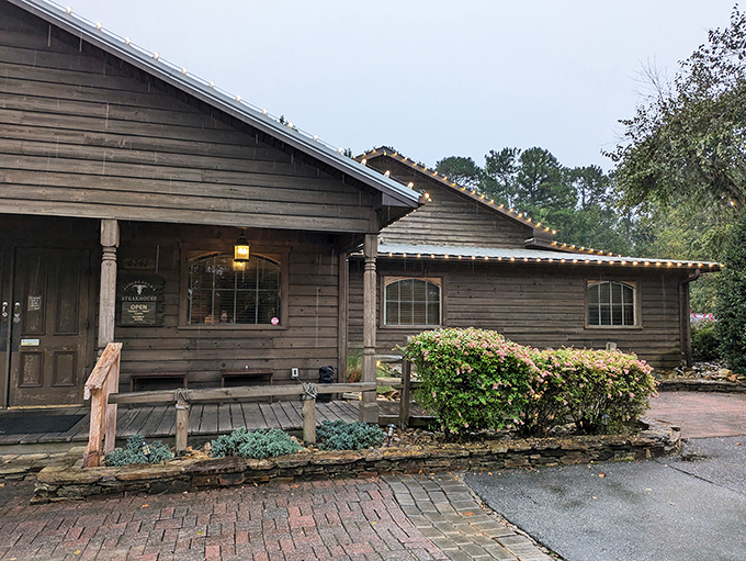This log cabin steakhouse isn't trying to be fancy—it's too busy being fantastic. String lights add a touch of magic to this meat-lover's paradise.