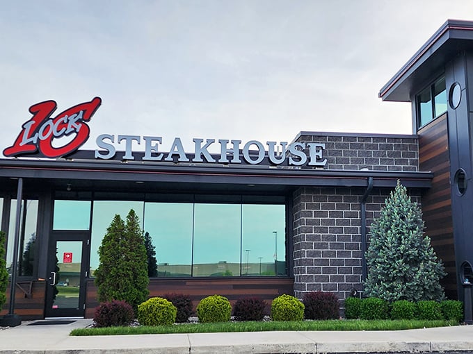 Where racing meets ribeyes! Lock Sixteen's checkered flag logo promises a finish line worth crossing.