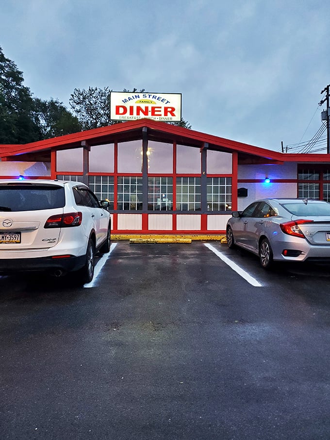 Main Street Family Diner (exterior dusk): As evening falls, that neon sign becomes a beacon for the breakfast-for-dinner crowd. Comfort food paradise awaits!