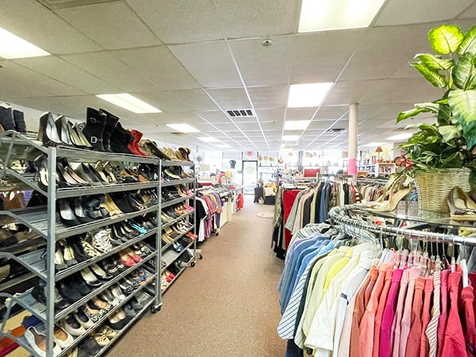 Rows of neatly organized shoes and colorful clothing racks – a thrifter's paradise where every aisle promises discovery.